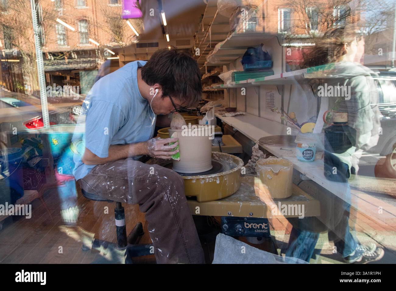 Ann Arbor, Michigan, USA. 9th Mar, 2025. A guy makes pottery at the Ann ...