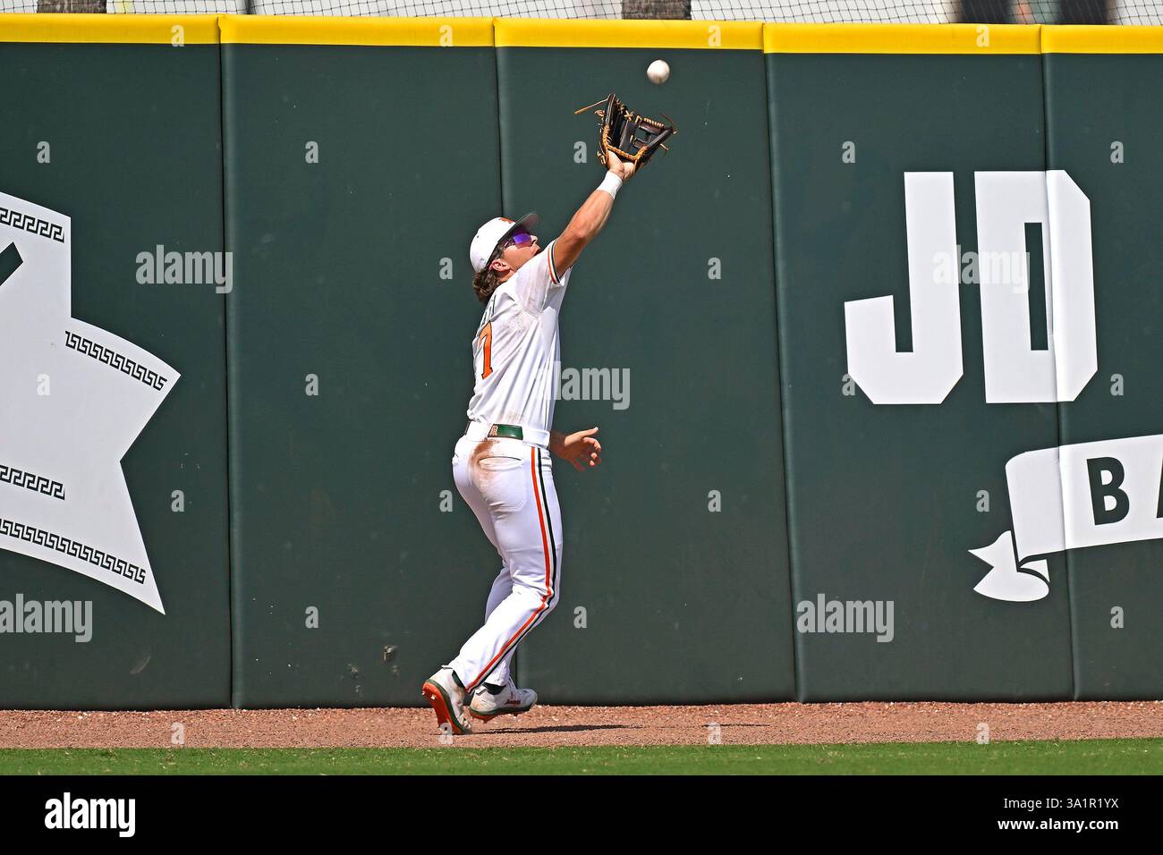CORAL GABLES, FL - MARCH 09: Miami outfielder Max Galvin (7) catches a ...