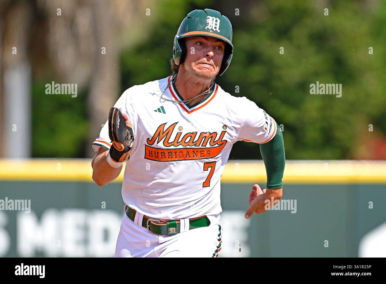 CORAL GABLES, FL - MARCH 09: Miami outfielder Max Galvin (7) runs to ...
