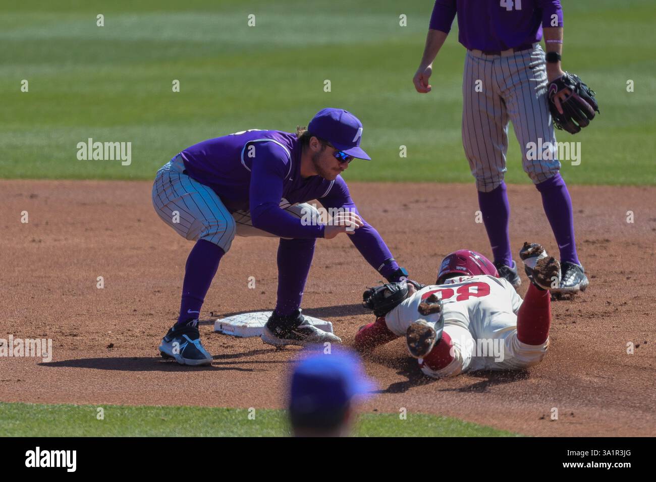March 9, 2025: Portland infielder Jonas Salk (14) applies the age to ...