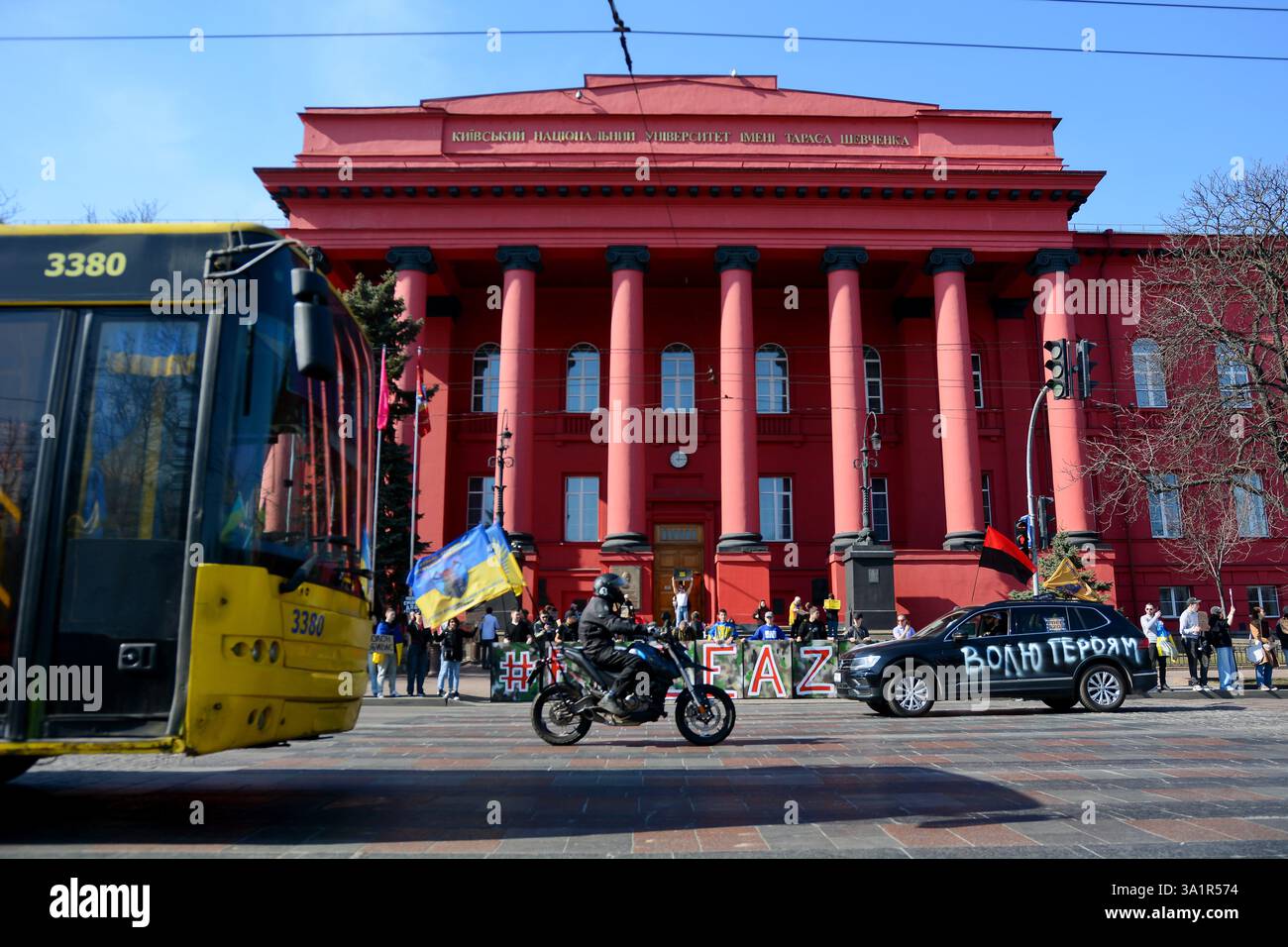 Activists, servicemen and relatives of Ukrainian POWs hold placards ...