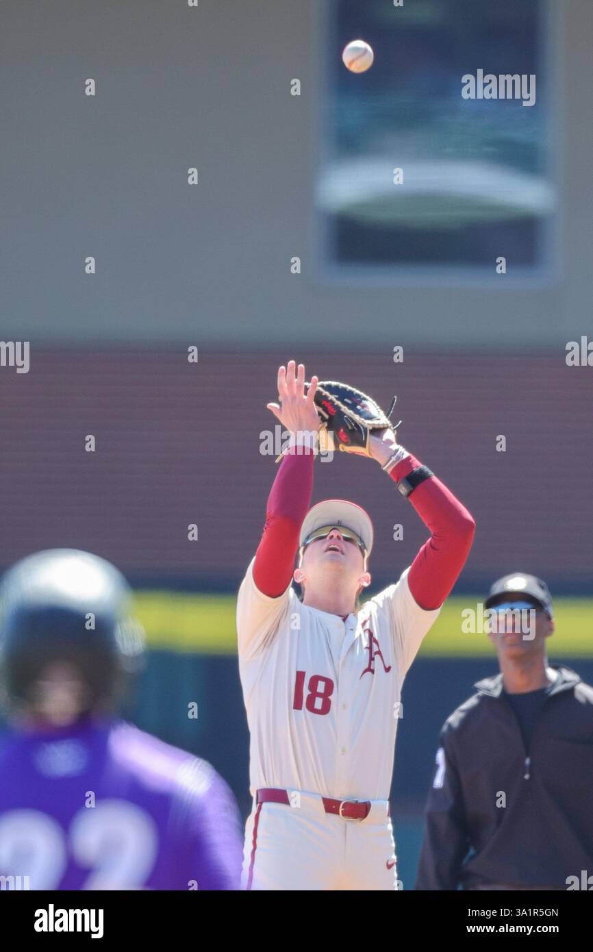 March 9, 2025: Arkansas infielder Reese Robinett (18) settles under an ...