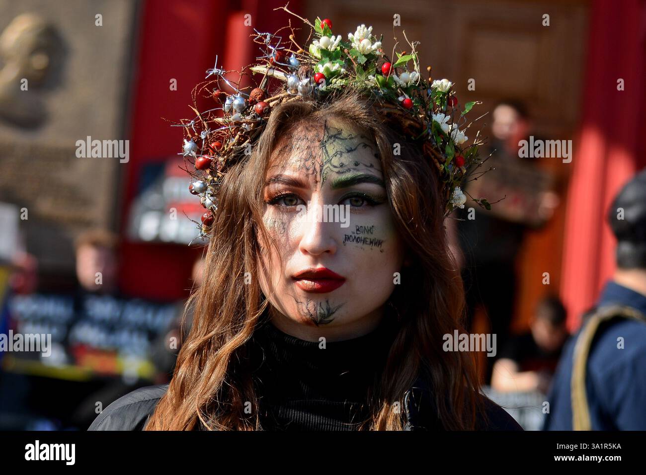 A woman looks on during the rally to urge for the return of Ukrainian ...