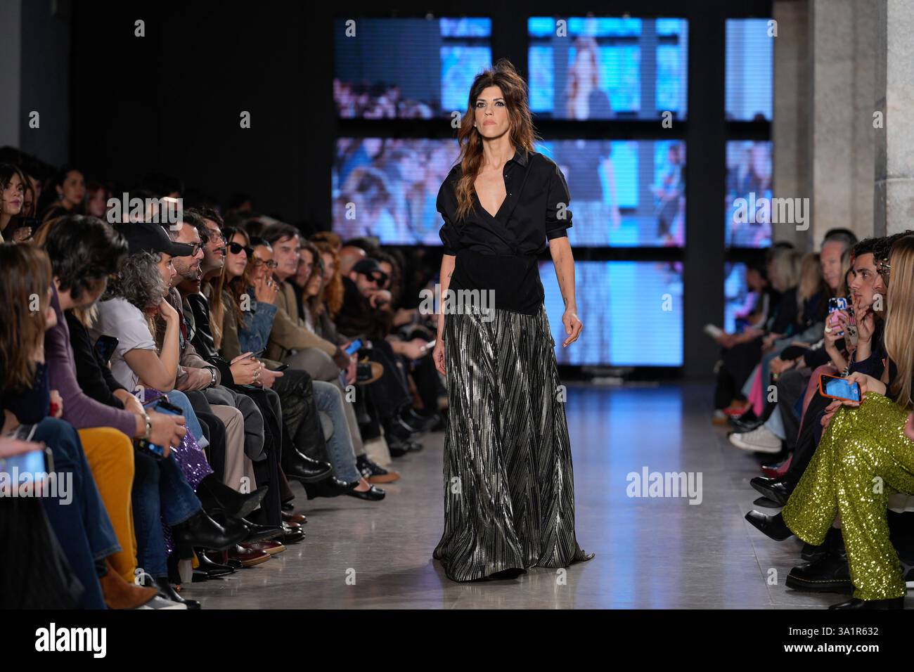 A model walks the runway during Nuno Baltazar fashion show at ...