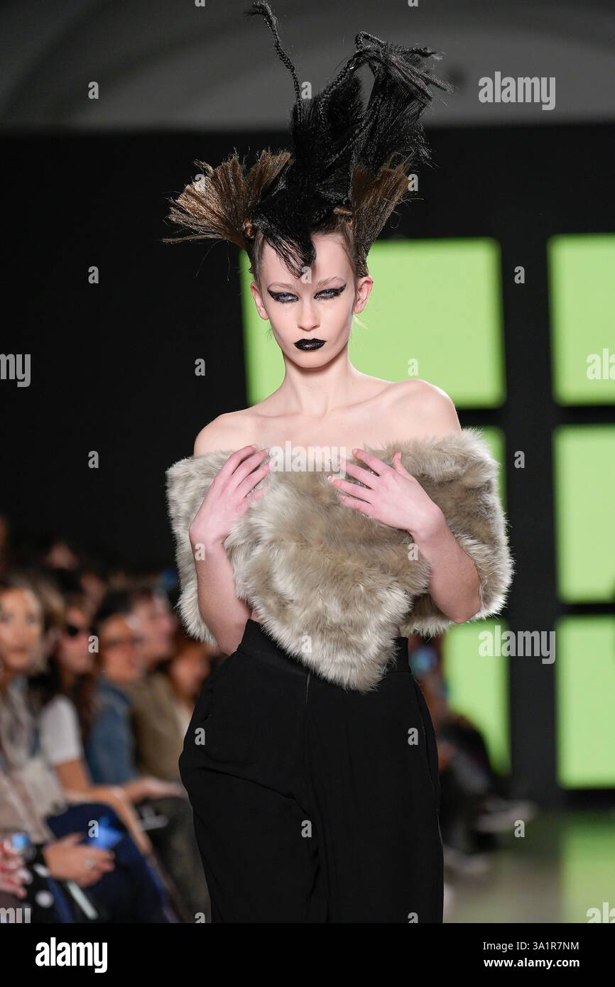 Lisbon, Portugal. 09th Mar, 2025. A model walks the runway during ...