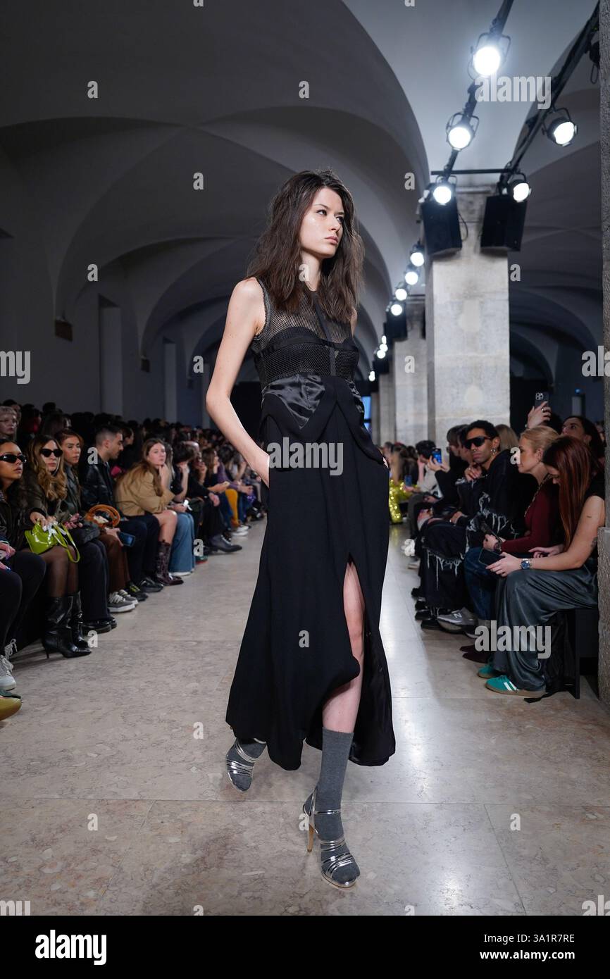 A model walks the runway during Nuno Baltazar fashion show at ...