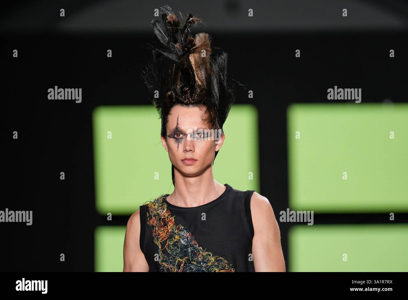 Lisbon, Portugal. 09th Mar, 2025. A model walks the runway during ...