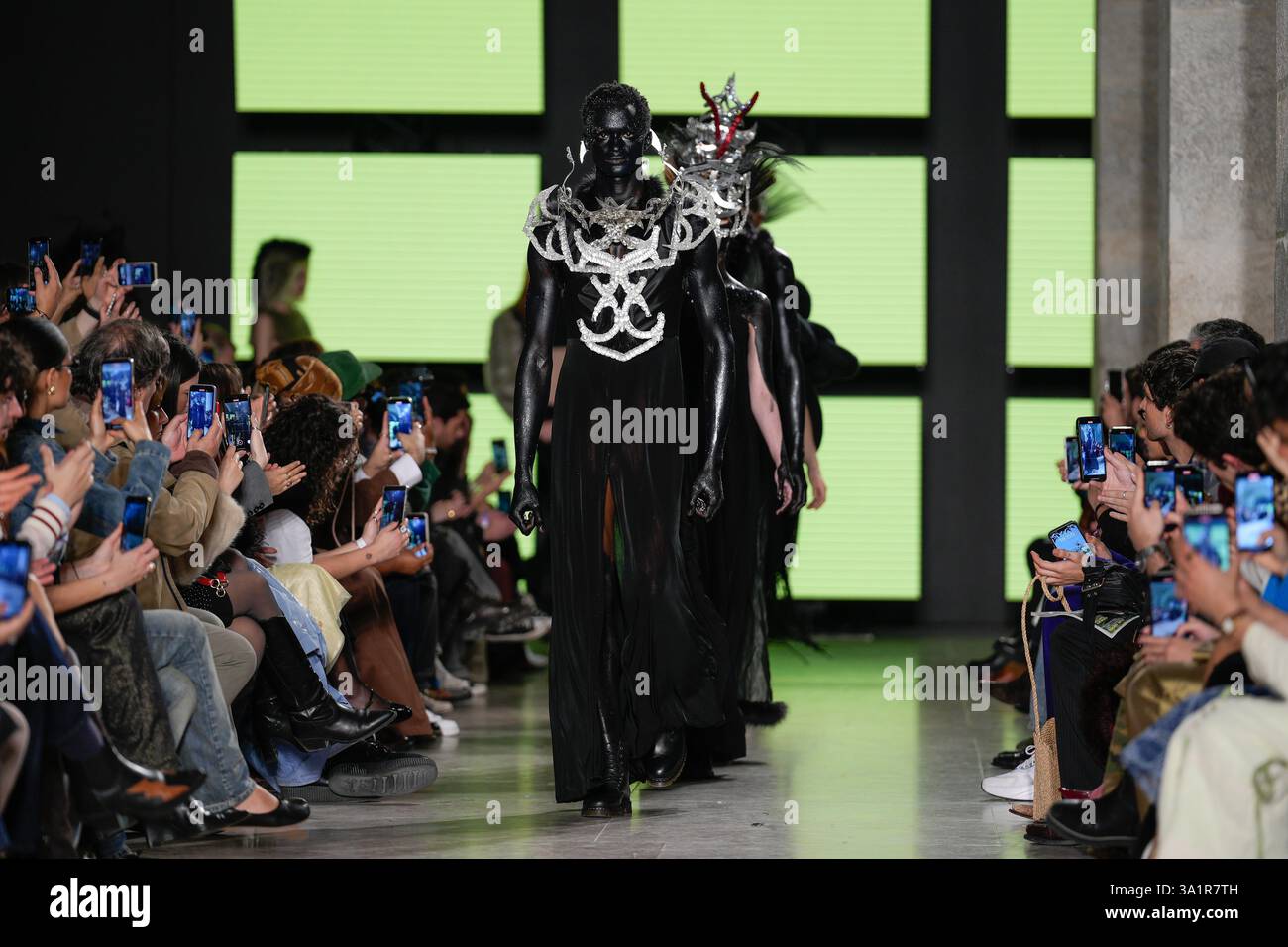 Lisbon, Portugal. 09th Mar, 2025. A model walks the runway during ...