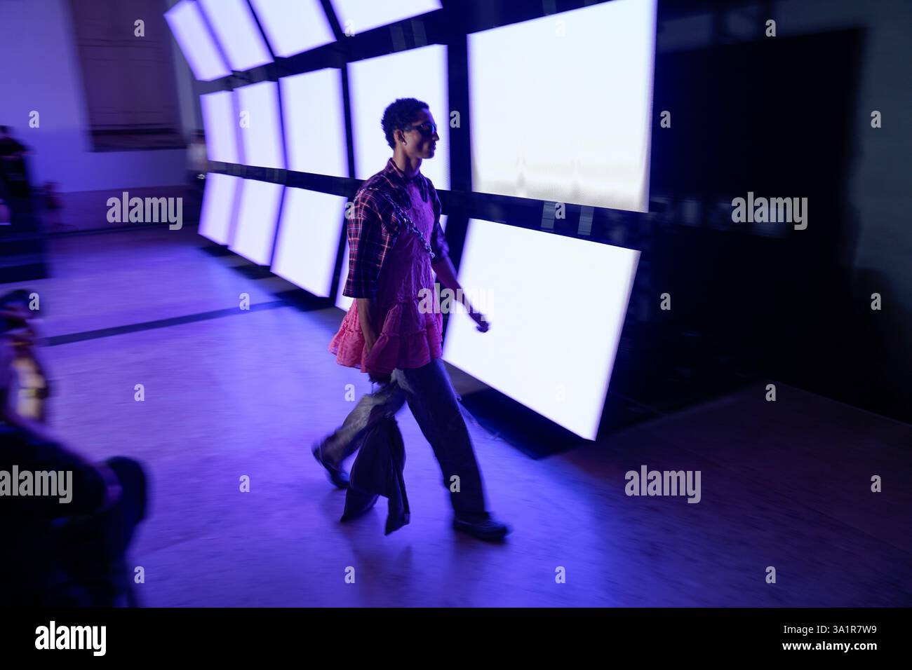 Lisbon, Portugal. 09th Mar, 2025. A model walks the runway during ...