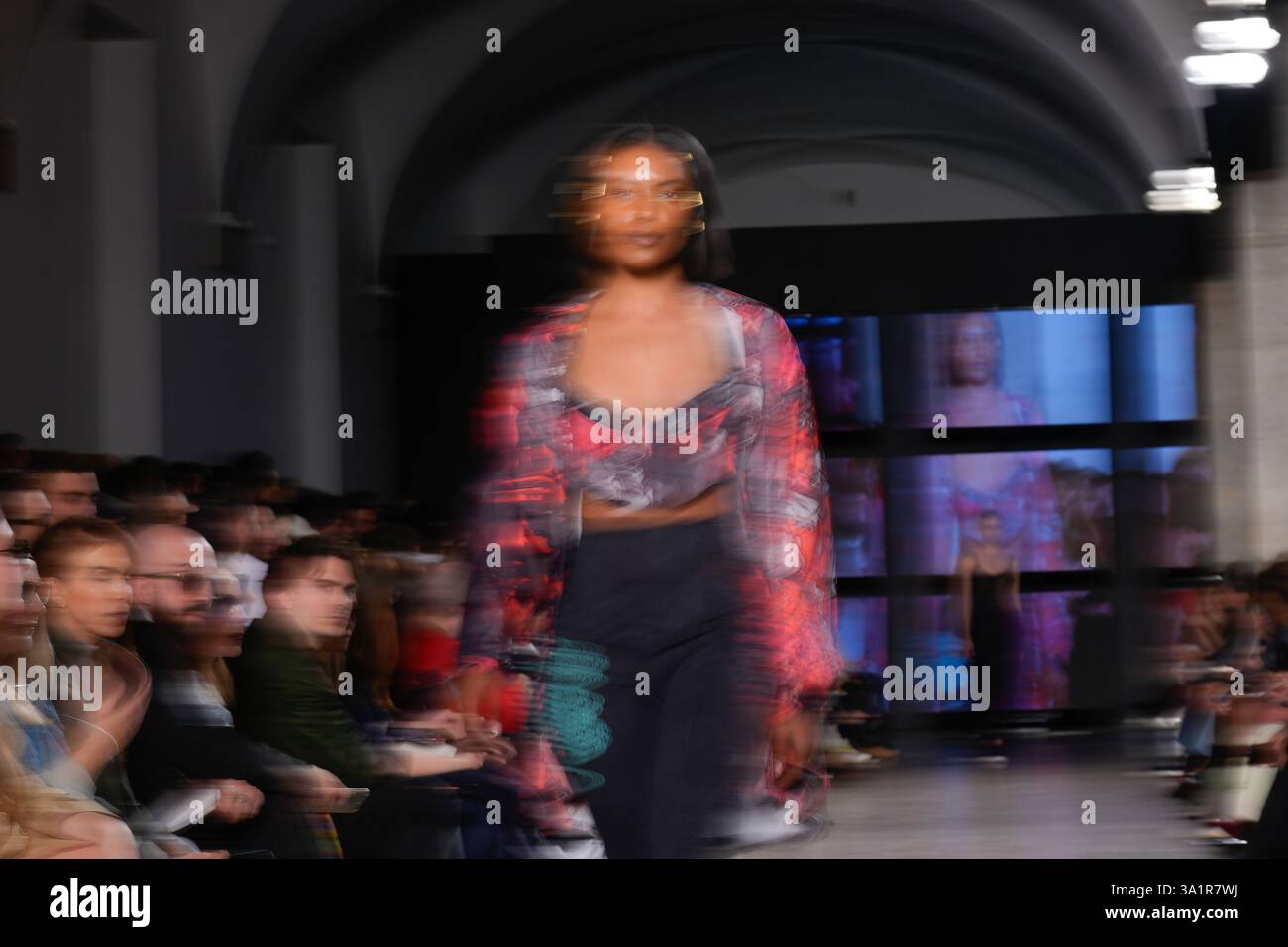 Lisbon, Portugal. 09th Mar, 2025. A model walks the runway during ...