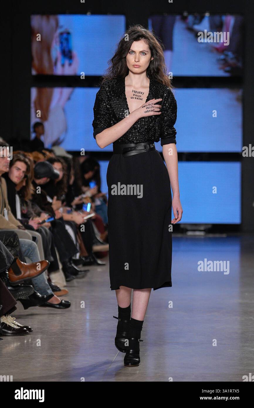 A model walks the runway during Nuno Baltazar fashion show at ...