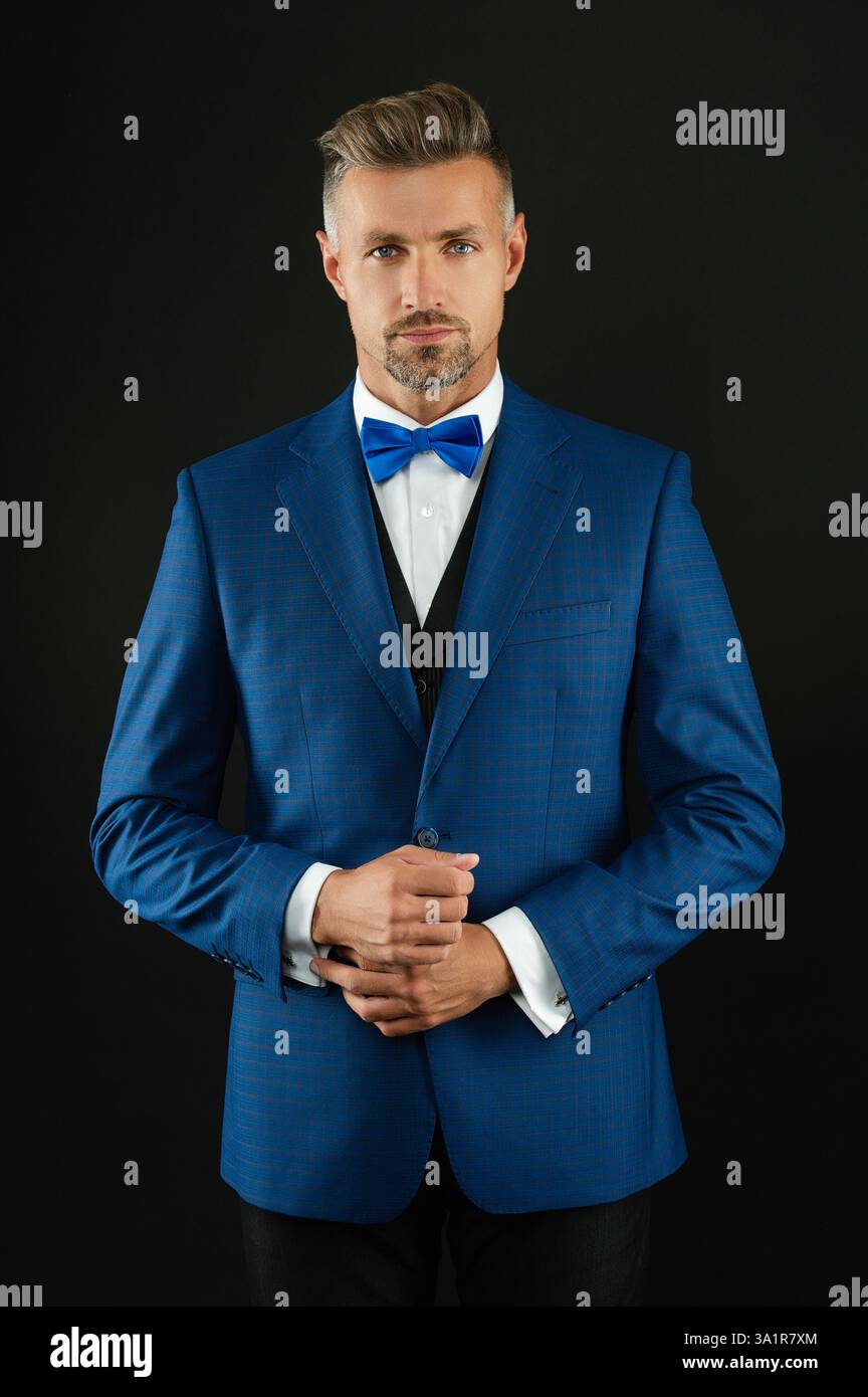 Menswear fashion. Elegant tuxedo bowtie. Rich businessman on formal ...