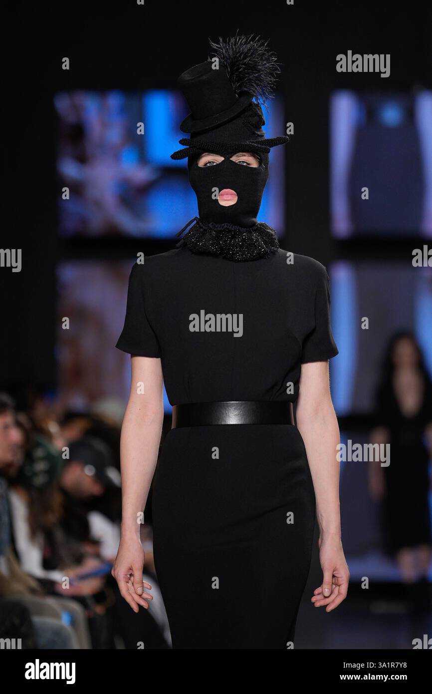 Lisbon, Portugal. 09th Mar, 2025. A model walks the runway during Nuno ...