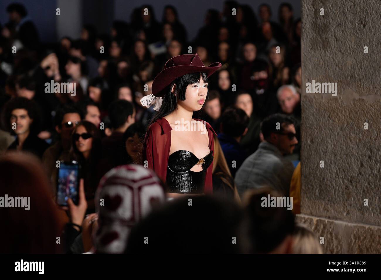 Lisbon, Portugal. 08th Mar, 2025. A model walks the runway during IED ...