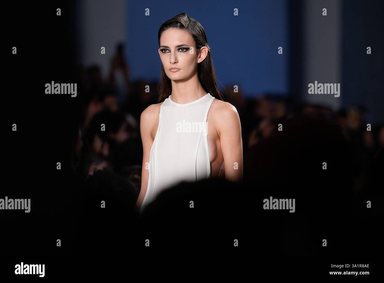 Lisbon, Portugal. 08th Mar, 2025. A model walks the runway during Luis ...