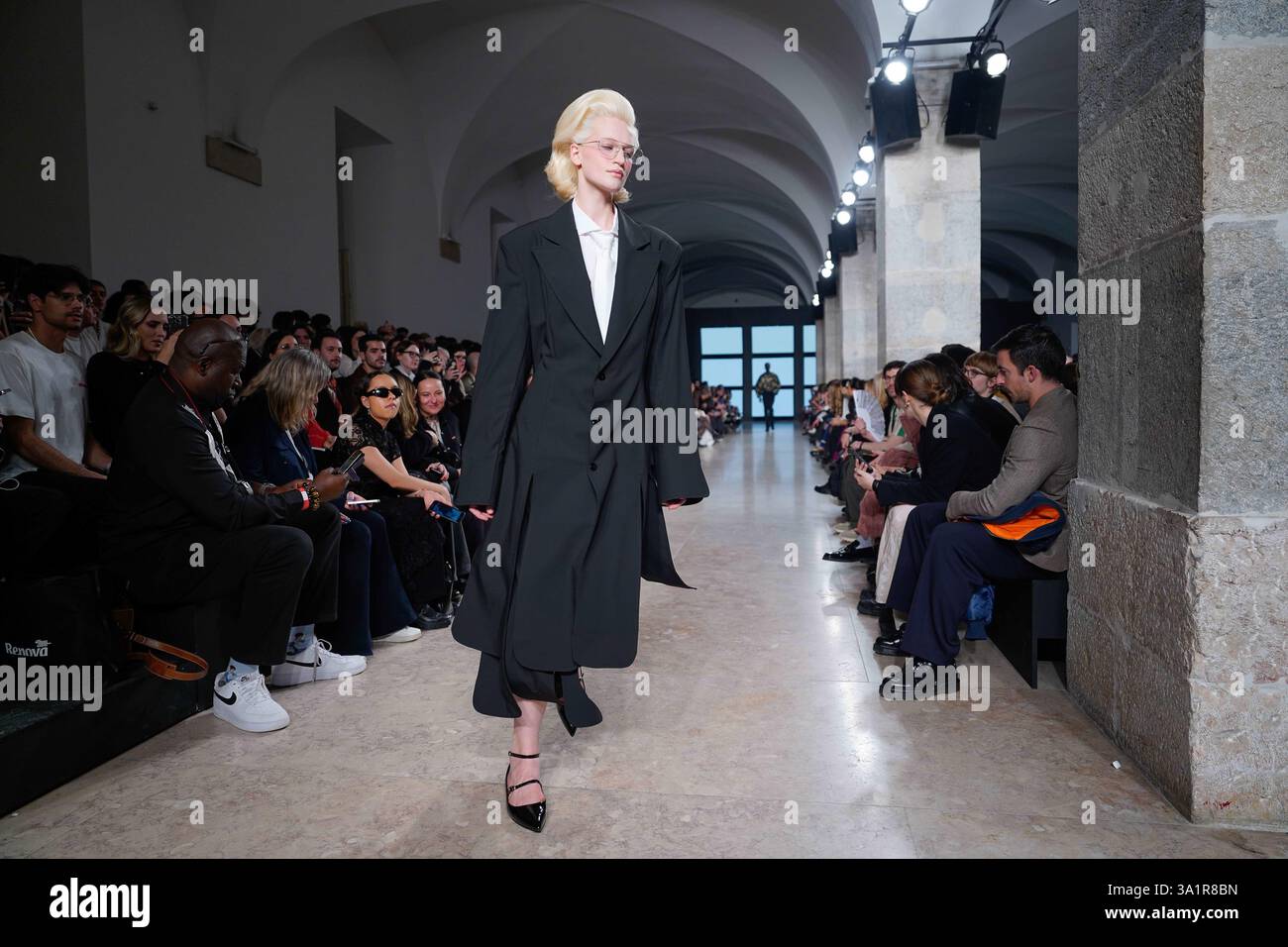 A model walks the runway during Luis Carvalho fashion show at ...