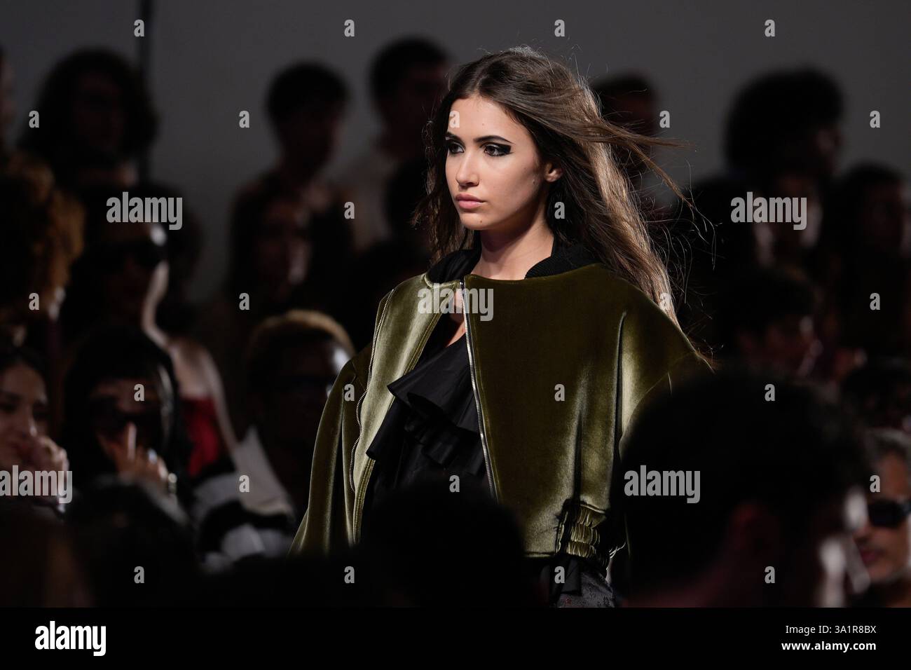 Lisbon, Portugal. 08th Mar, 2025. A model walks the runway during ...