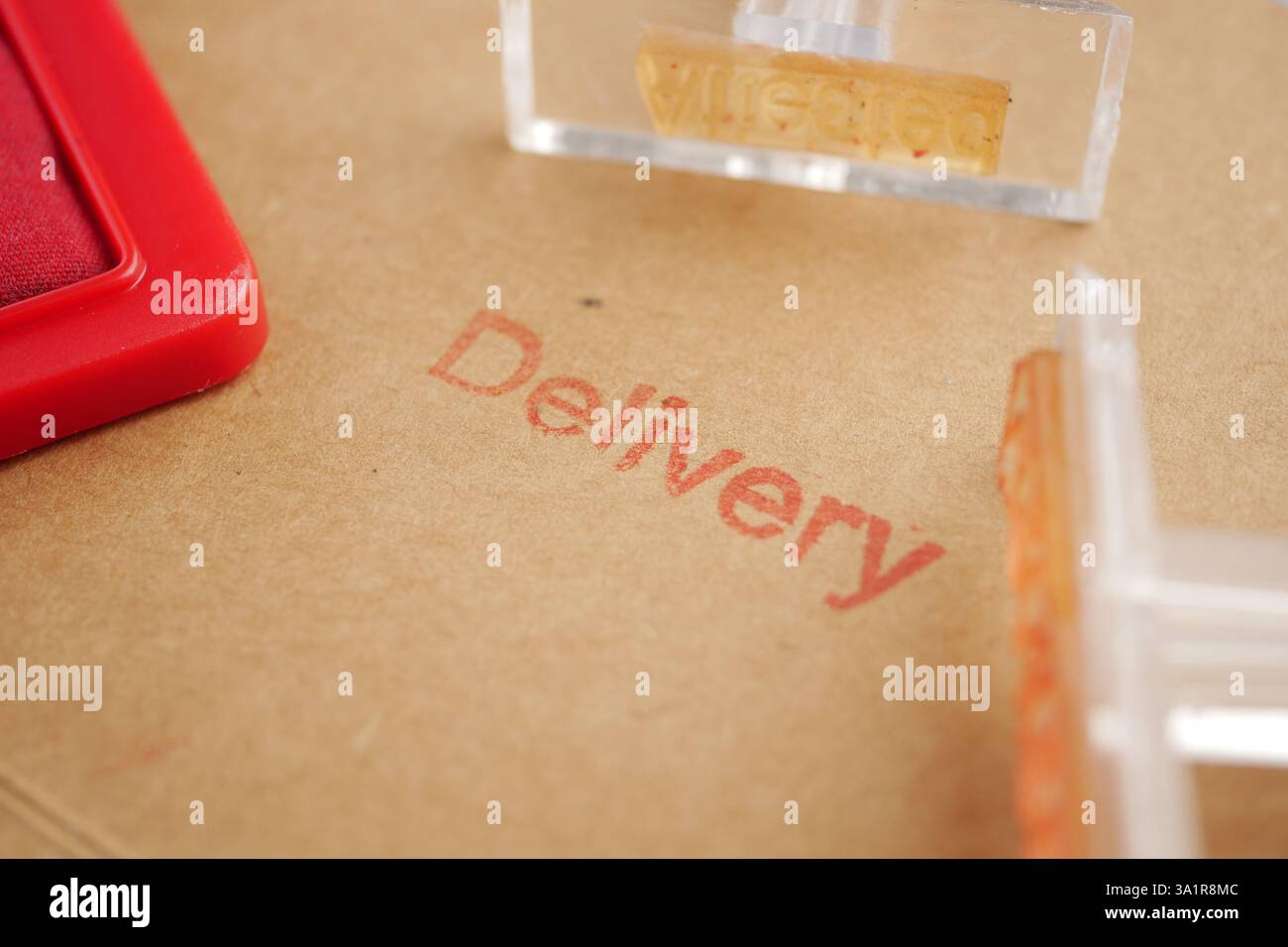 Stamps and ink for delivery marking on cardboard package Stock Photo ...