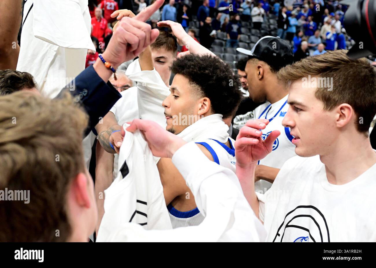 ST. LOUIS, MO - MARCH 09: Drake players react after winning the ...