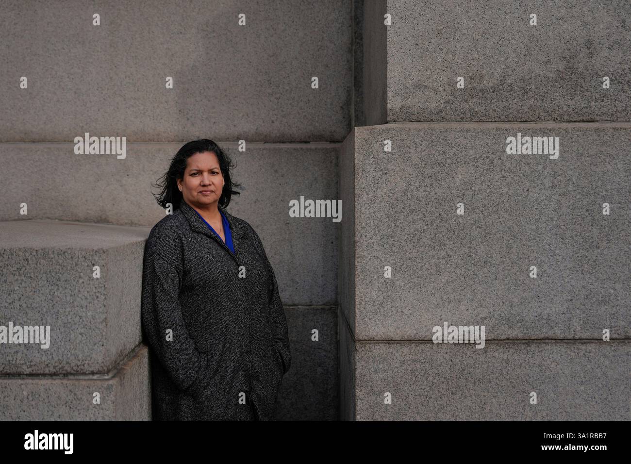 Karen Ortiz, an administrative judge at the Equal Employment Opportunity Commission, poses for ...
