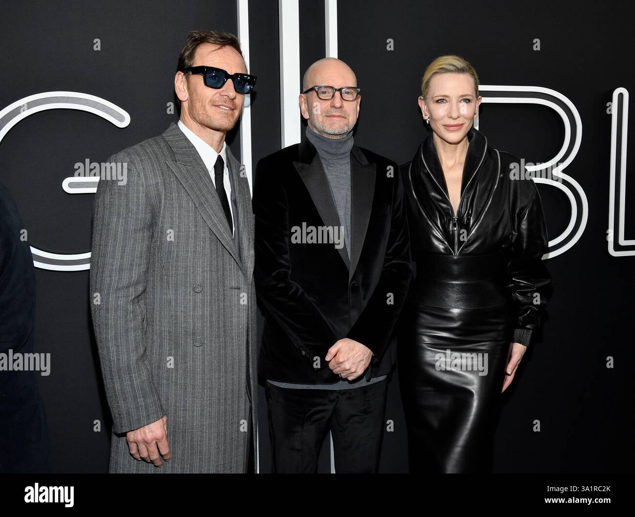 Michael Fassbender, left, Steven Soderbergh and Cate Blanchett attend the premiere of Focus ...
