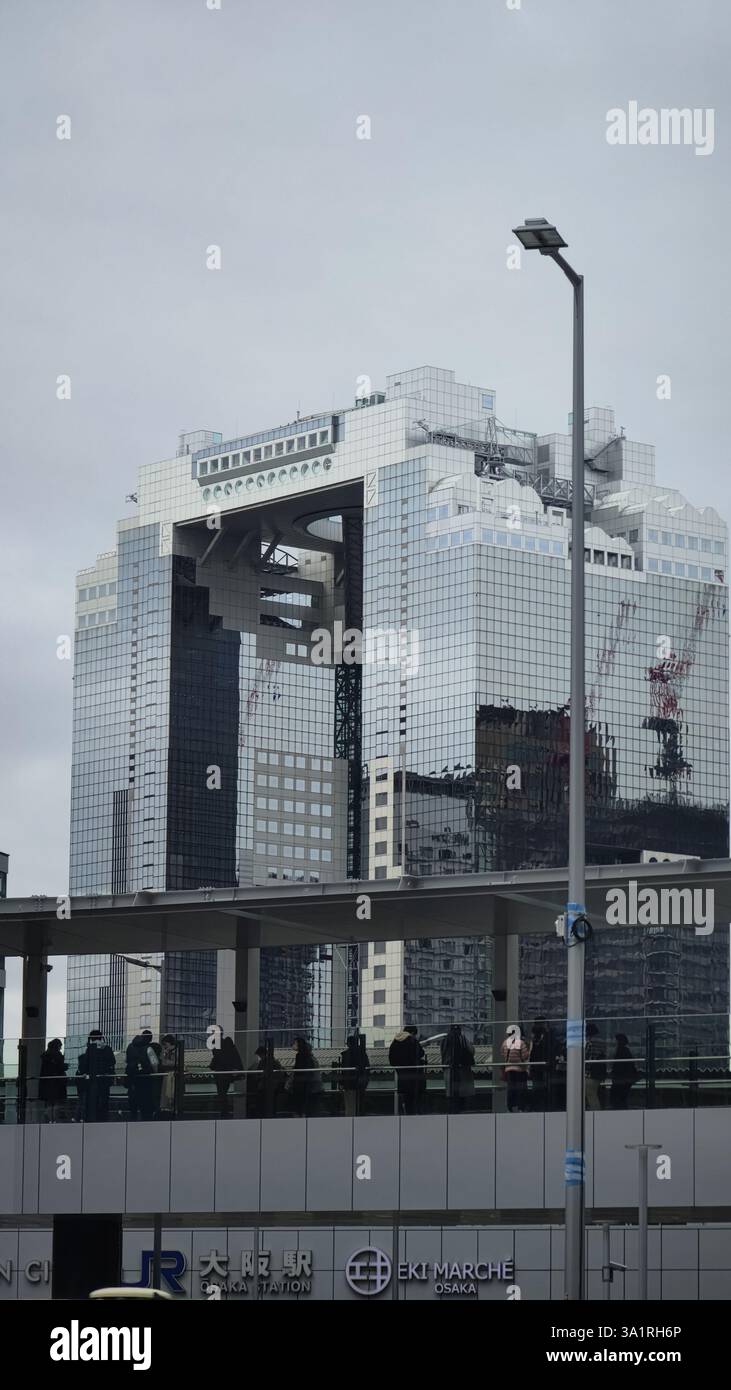 Umeda Sky Building exterior and Osaka Station pedestrian overpass ...