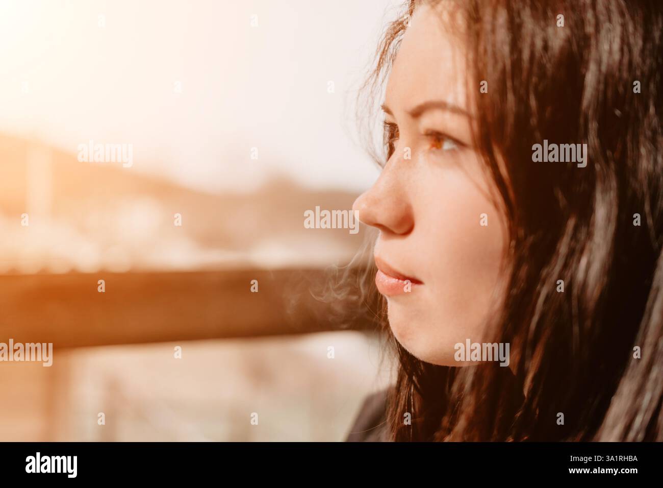 Woman Portrait Outdoors Sunset - Closeup portrait of a woman looking ...