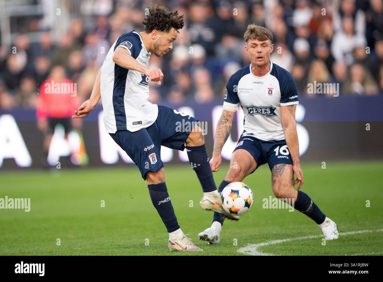 AGF's Mikael Anderson finishes in front of Max Power during the ...
