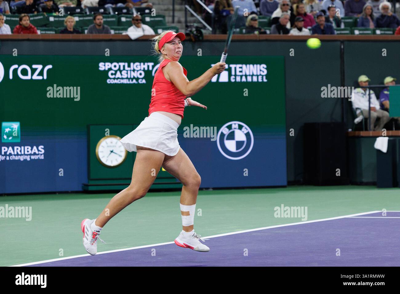 March 9, 2025: Clara Tauson (DEN) hits a shot during her match against Mirra Andreeva in round 3 ...