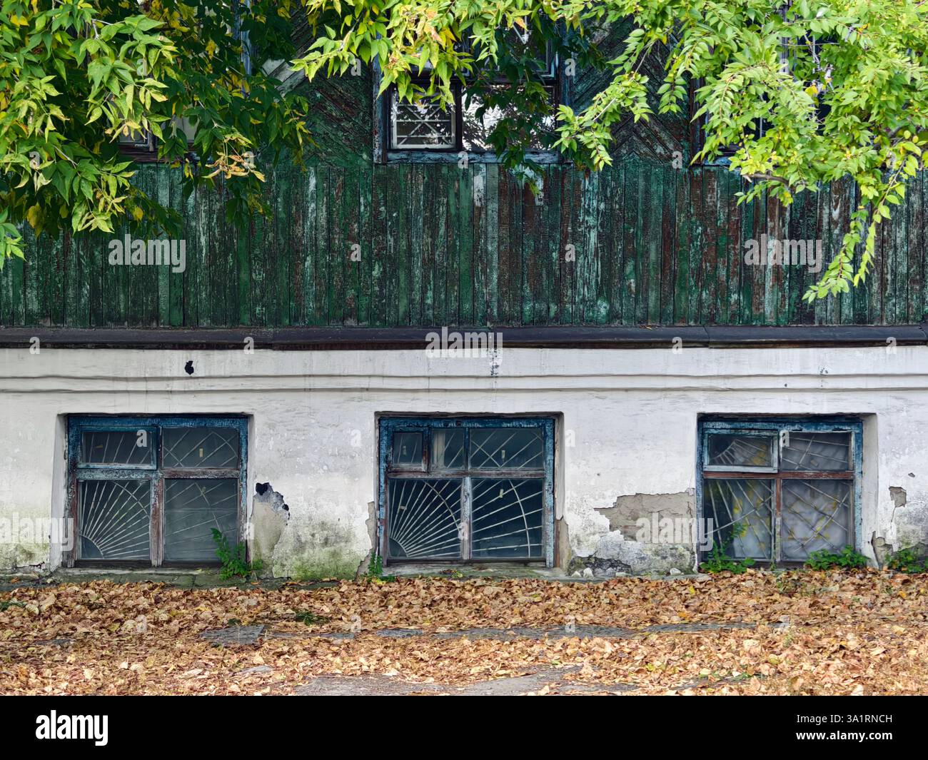 low-level windows in the house on the first floor. the old architecture ...