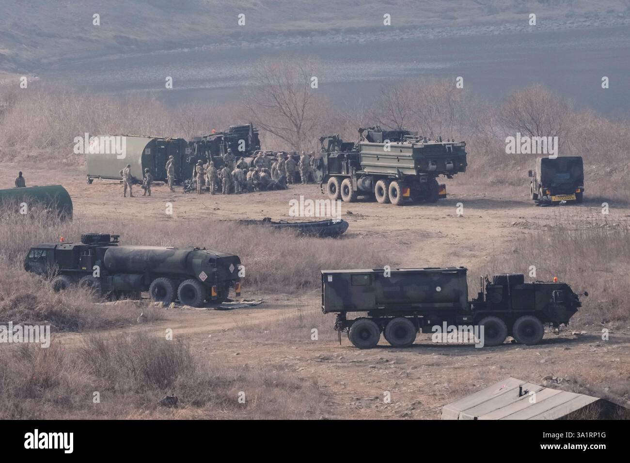 U.S. Army soldiers prepare to cross the Hantan river at a training ...