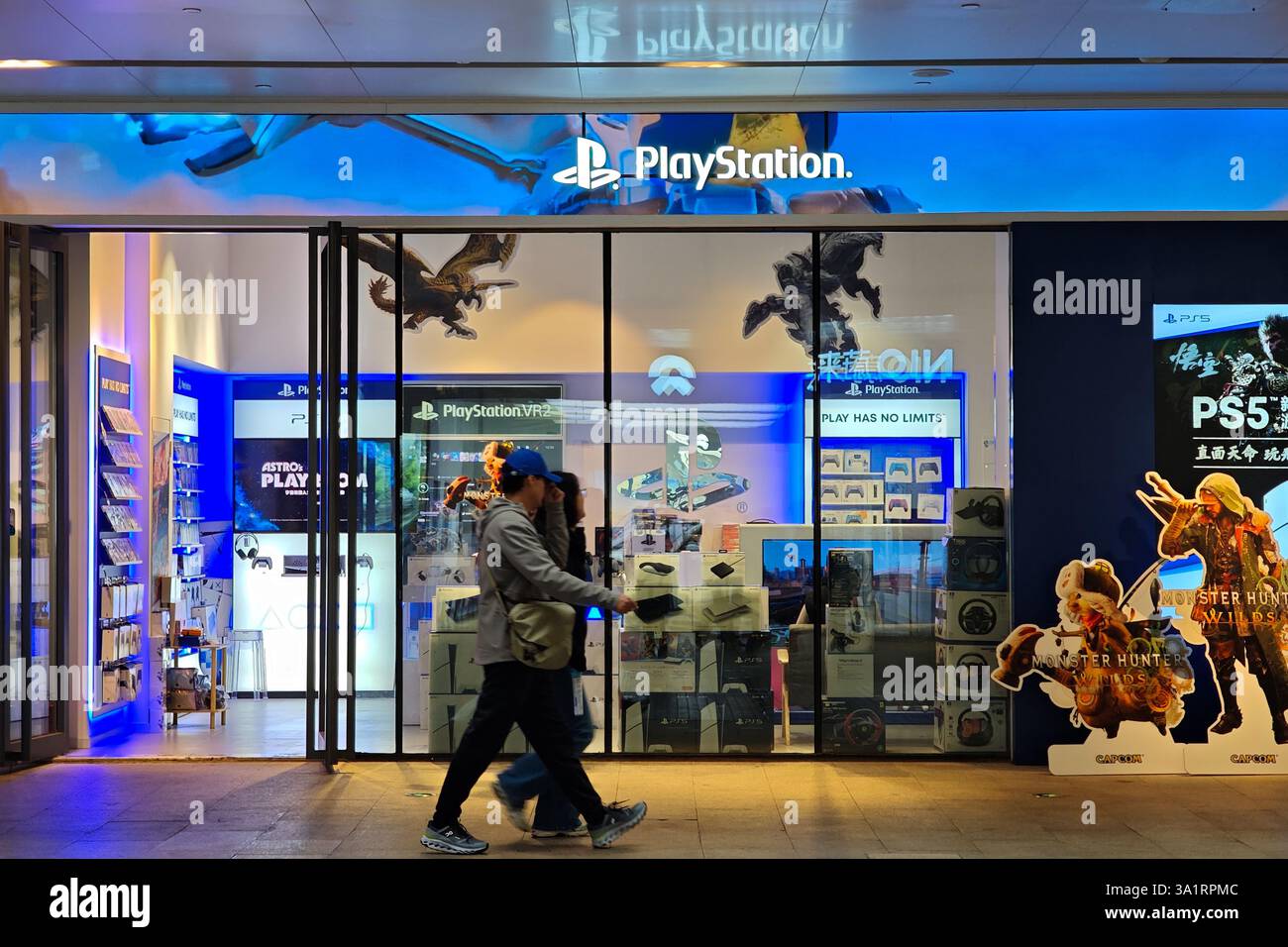 SHANGHAI, CHINA - MARCH 10, 2025 - Pedestrians pass a sony PlayStation ...