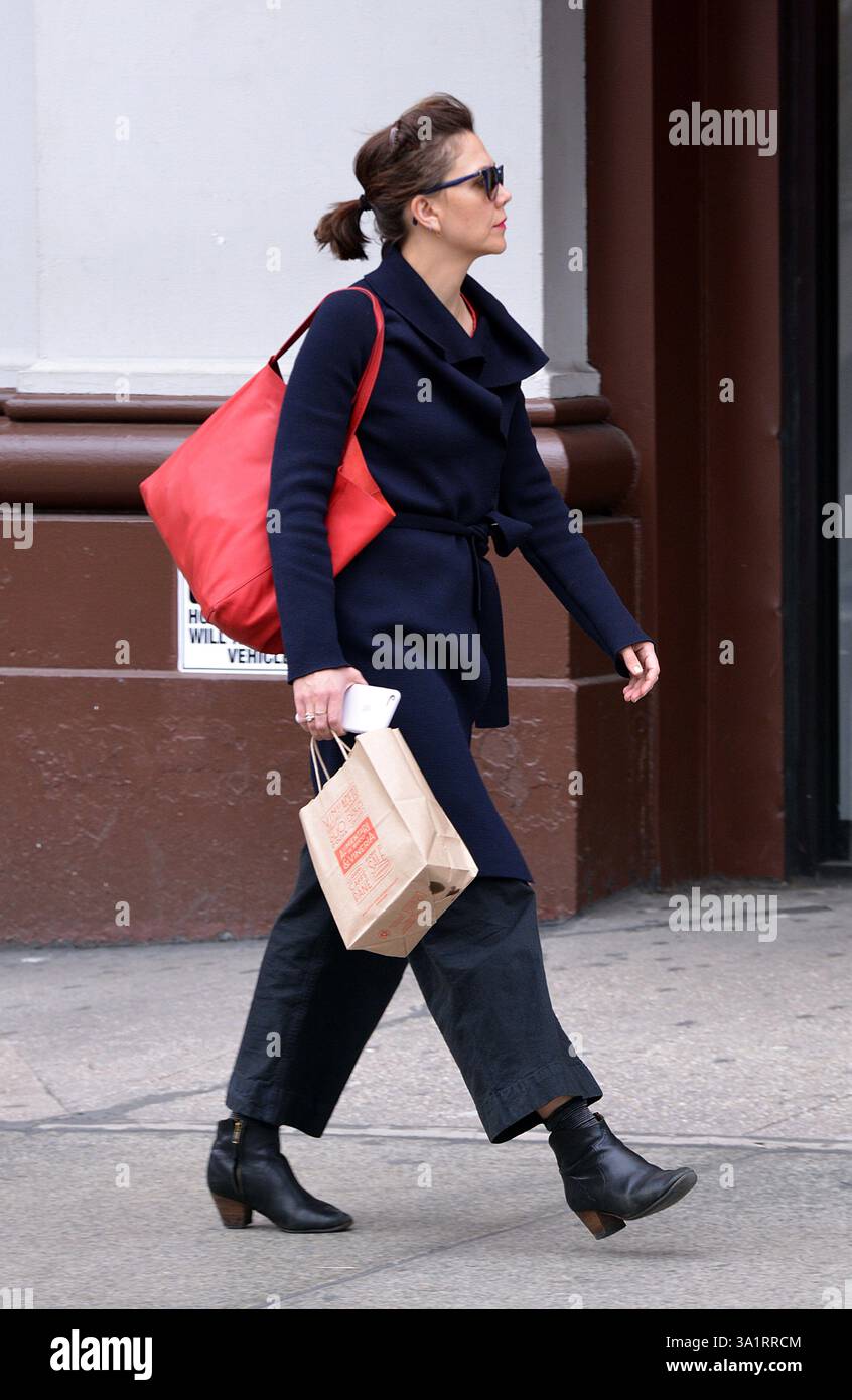 Actress Maggie Gyllenhaal walks in Soho on March 18 2016 in New York City Stock Photo - Alamy