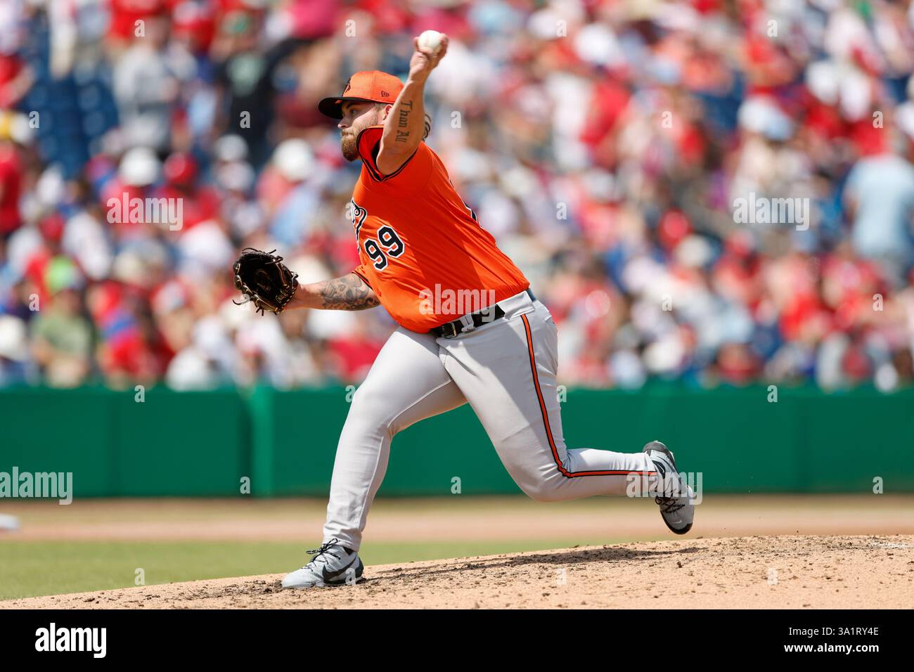 Clearwater, FL: Baltimore Orioles pitcher Riley Cooper (99) delivers a ...