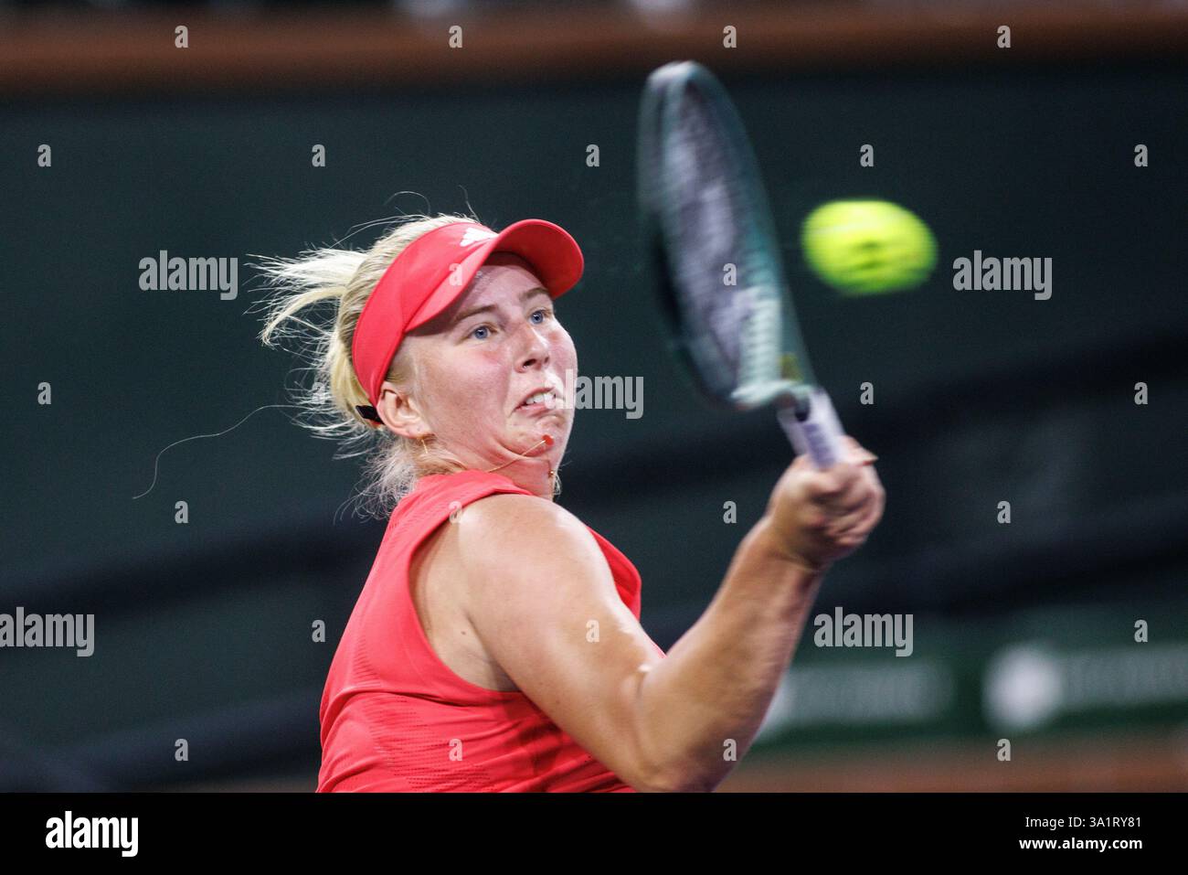 March 9, 2025: Clara Tauson (DEN) hits a shot during her match against ...