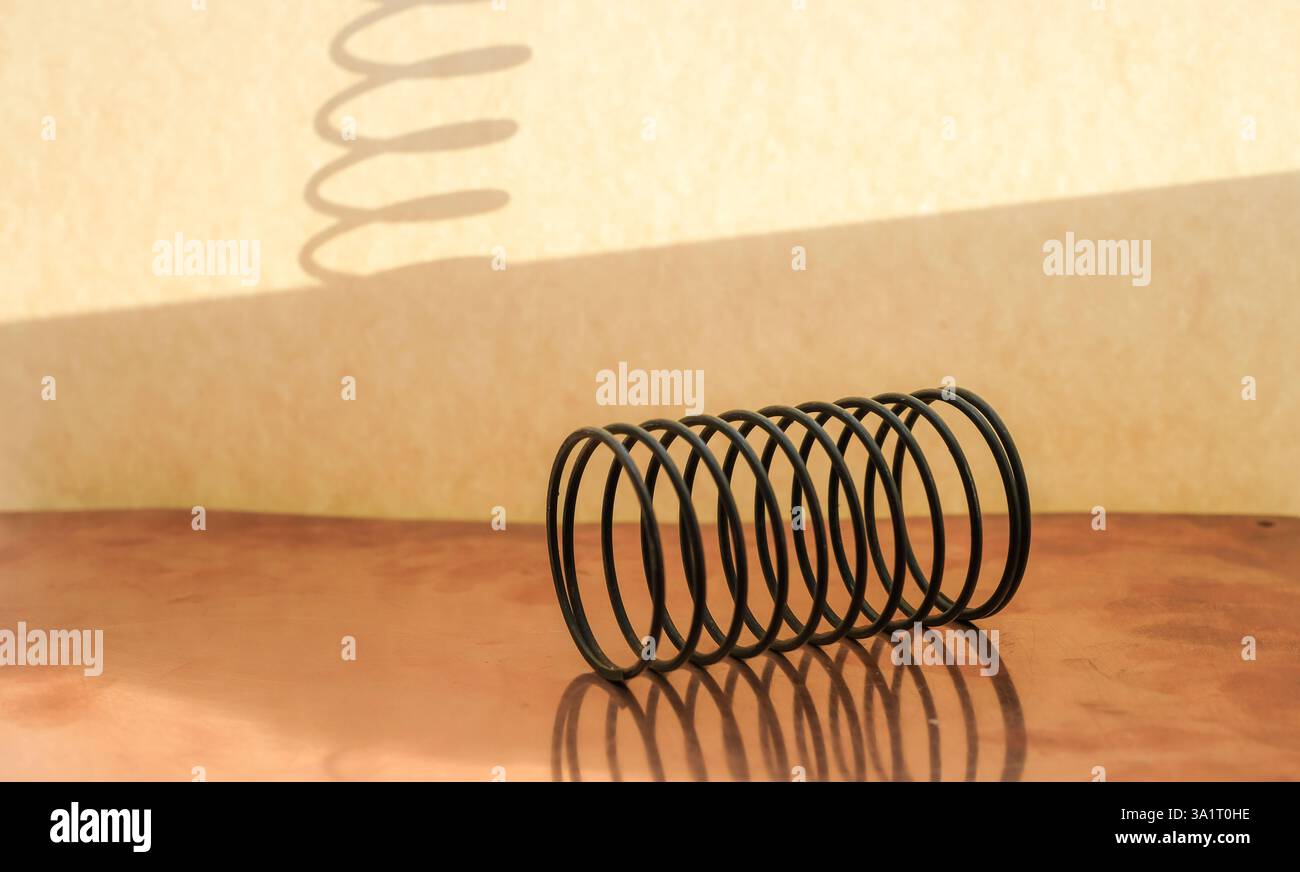 Metal Springs on the Copper Surface. Sunlight. Reflection and Shadow ...