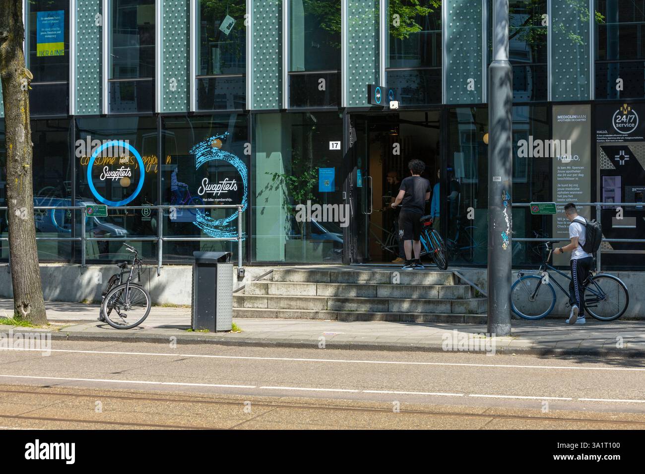 Swapfiets Flagship bike Store, shop sign above the entrance Stock Photo ...