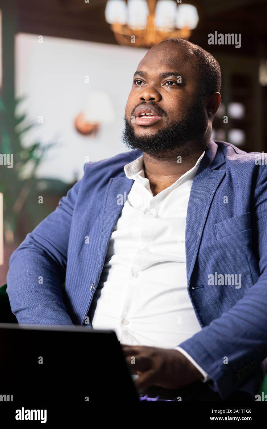 Diverse secret service duo in a CIA library lounge reviewing strategic ...