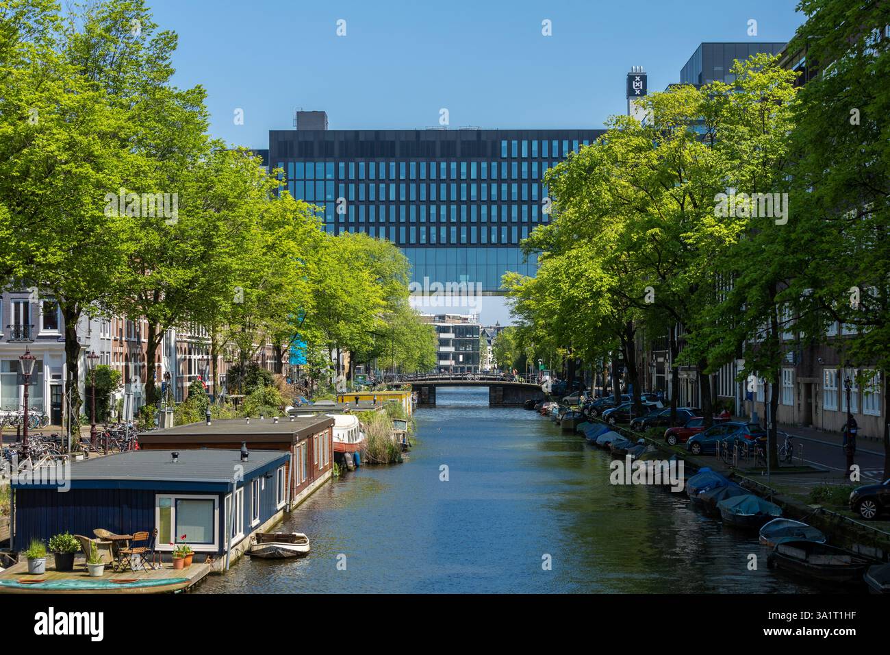 University of Amsterdam building above the canal (Nieuwe Achtergracht ...