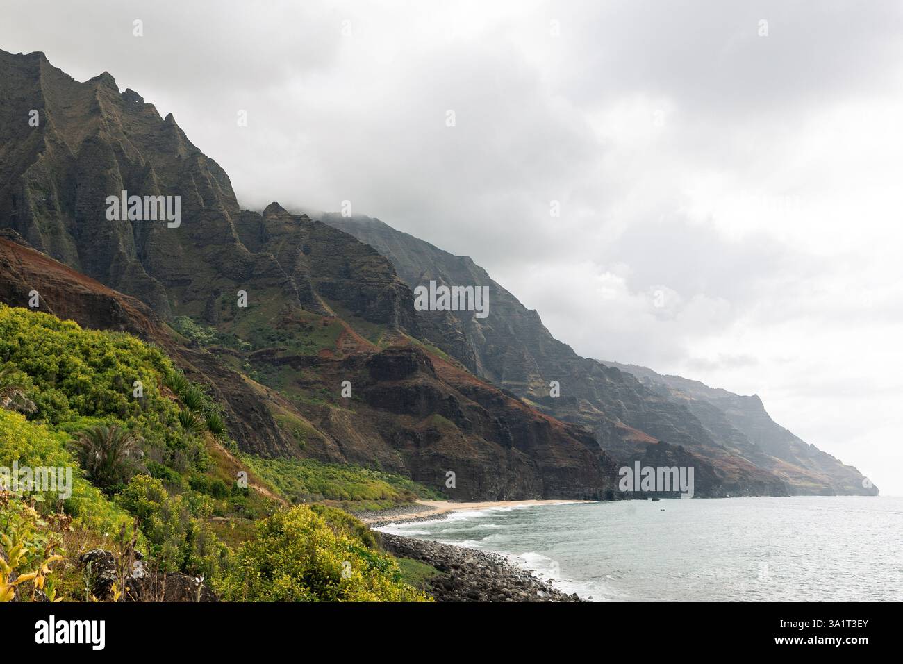 Misty, jagged coast line of Na Pali Coast, Kauai, Hawaii Stock Photo ...