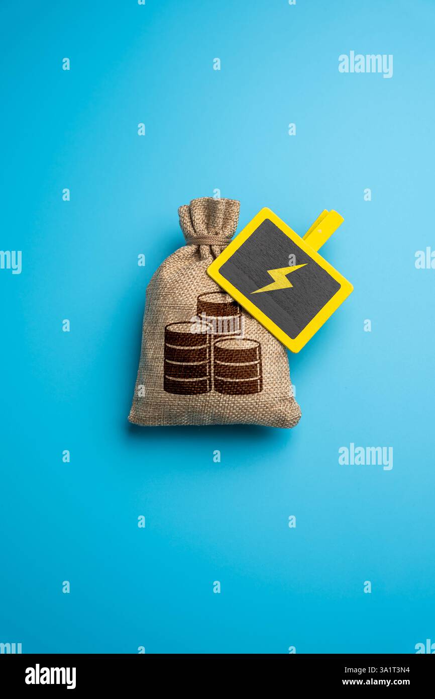 Money bag and lightning of electricity. Concept of cost of electricity ...