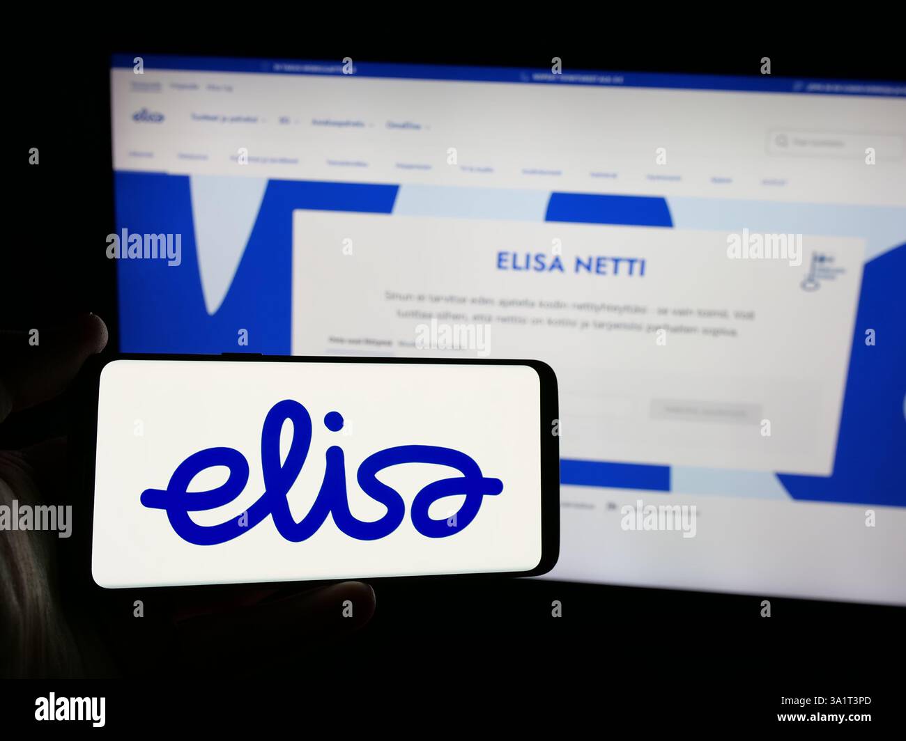 In this photo illustration, a person is holding a smartphone with the ...