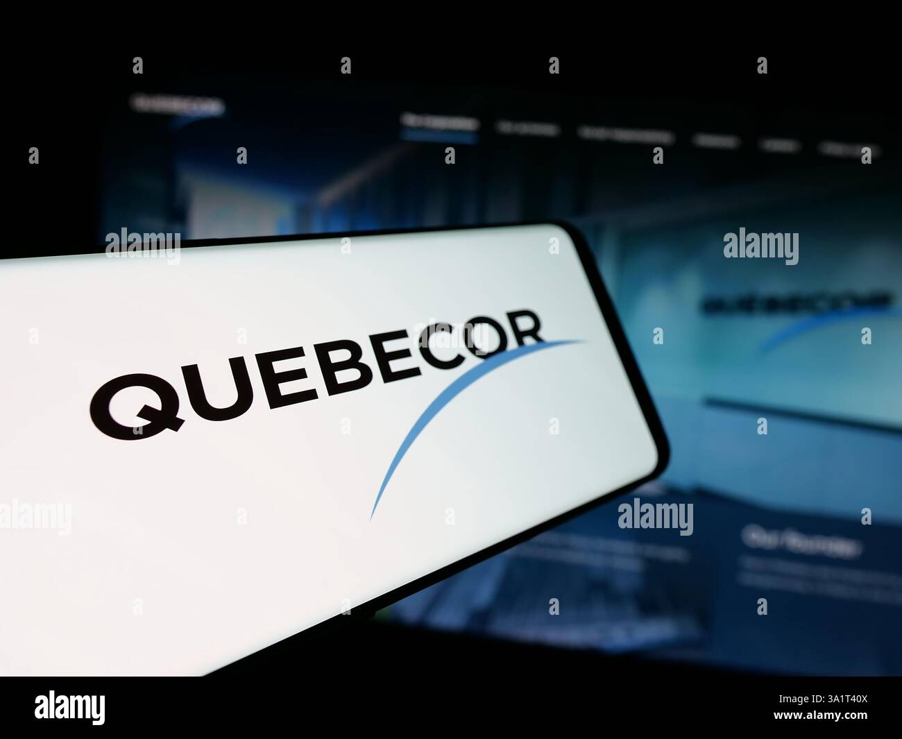 In this photo illustration, a mobile phone with the logo of Canadian ...