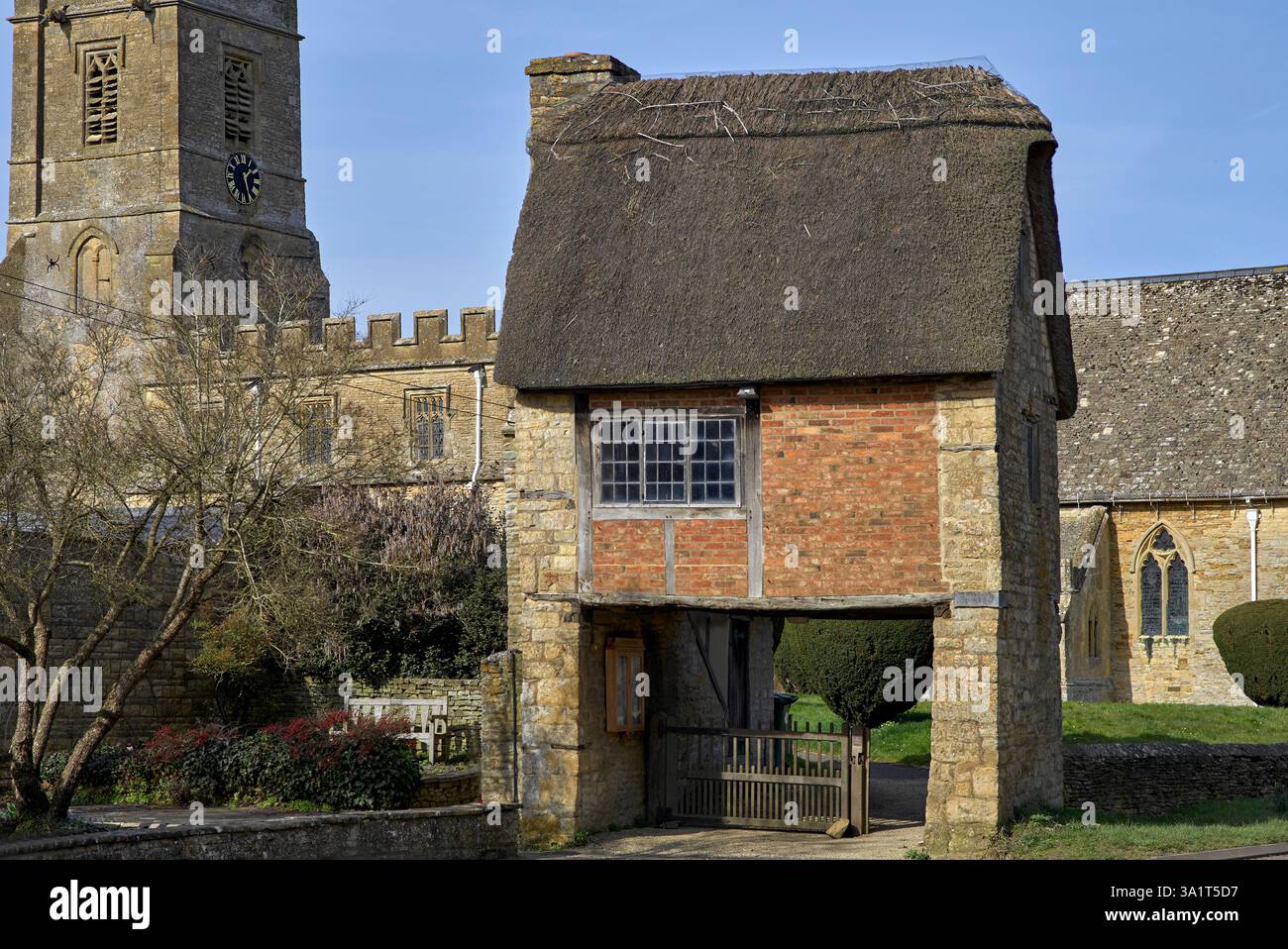 St Peter & St Paul Church, Long Compton, with thatched lychgate ...