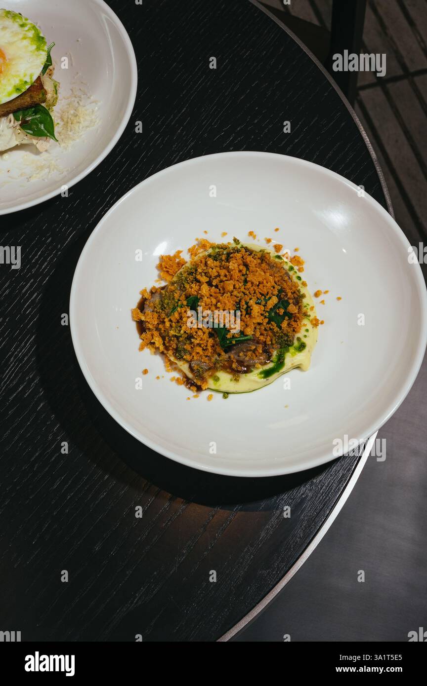 beef stroganoff puree and fried onions Stock Photo - Alamy