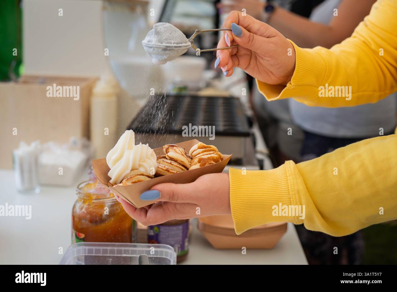 Dutch Mini Pancakes Poffertjes. Fluffy mini pancakes that are served ...
