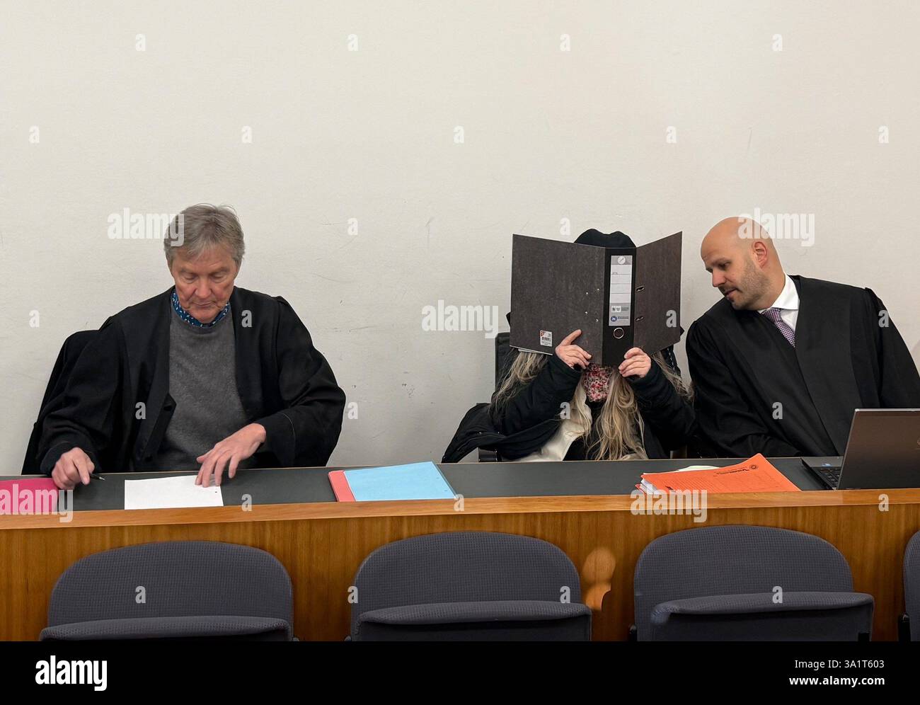 10 March 2025, Hesse, Kassel: The defendant sits between her defense ...