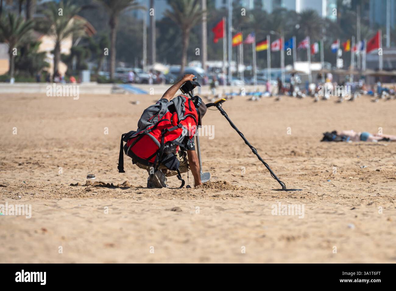 Agadir, Morocco - February 21, 2025: Beachgoers enjoy the sun while ...