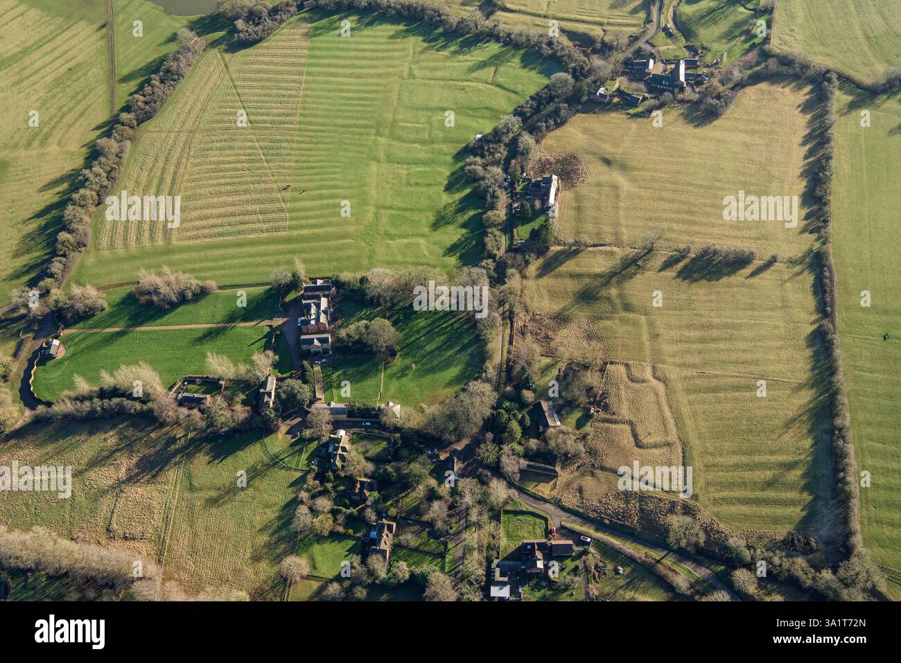 The earthwork remains of abandoned areas of the medieval village of ...