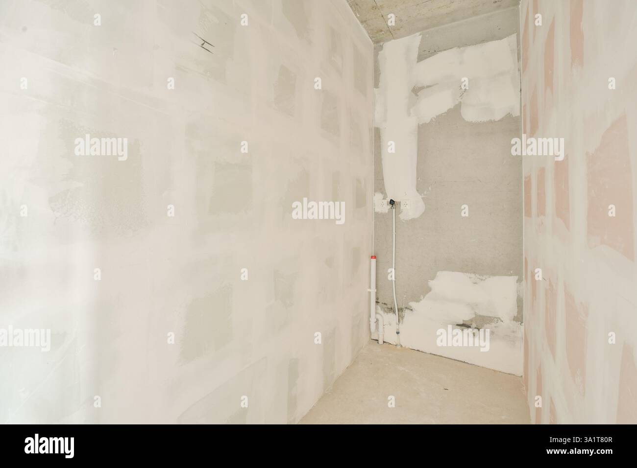 The image showcases an unfinished interior space with light-colored ...